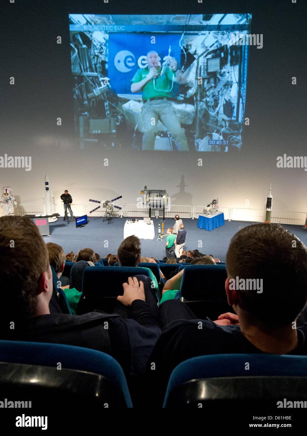 Pupils watch a live broadcast by Dutch astronaut Andre Kuipers from the ...