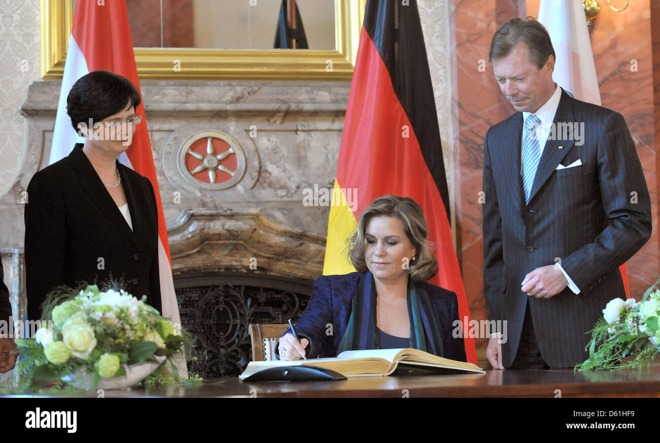 Grand Duke Henri of Luxembourg and Grand Duchess Maria Teresa sign the ...