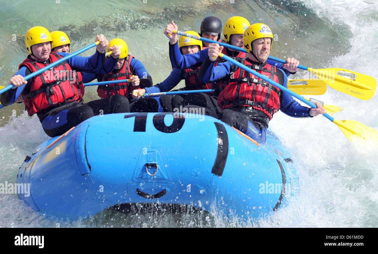 Nordic skier Axel Teichmann (R) paddles during a white water rafting ...