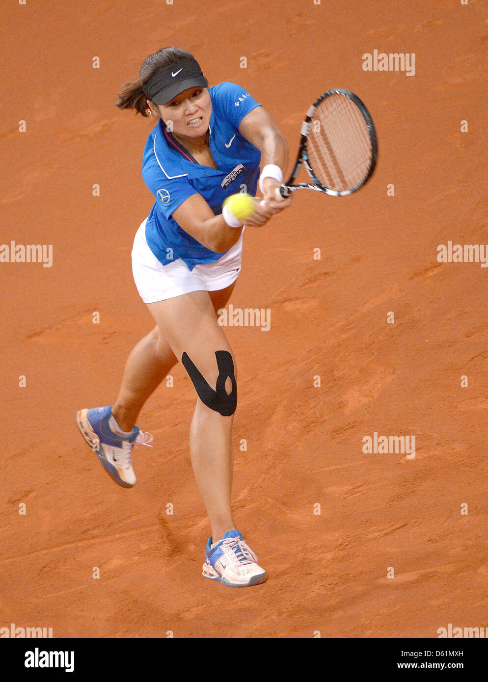 China's Li Na hits the ball during the quarterfinal match against ...