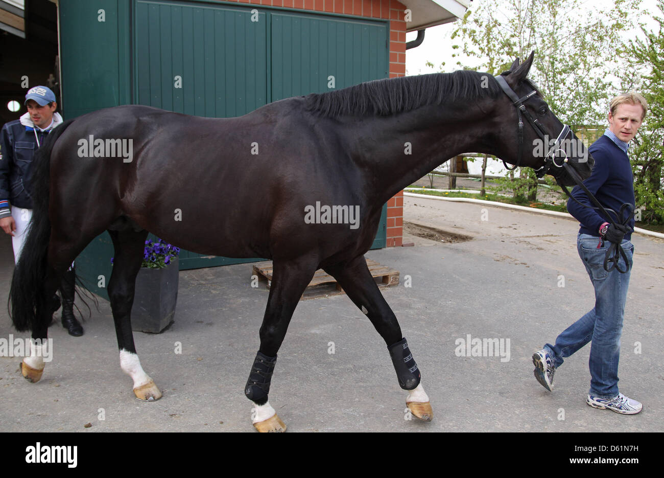 German dressage ride Matthias Rath leads his horse "Totilas" to the ...