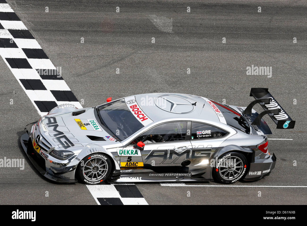 Mercedes race driver Jamie Green from Great Britain crosses the finish ...