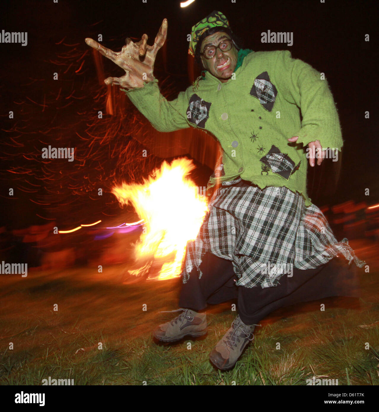 A visitor in witch costumes celebrates the 'Walpurgisnacht' witches ...