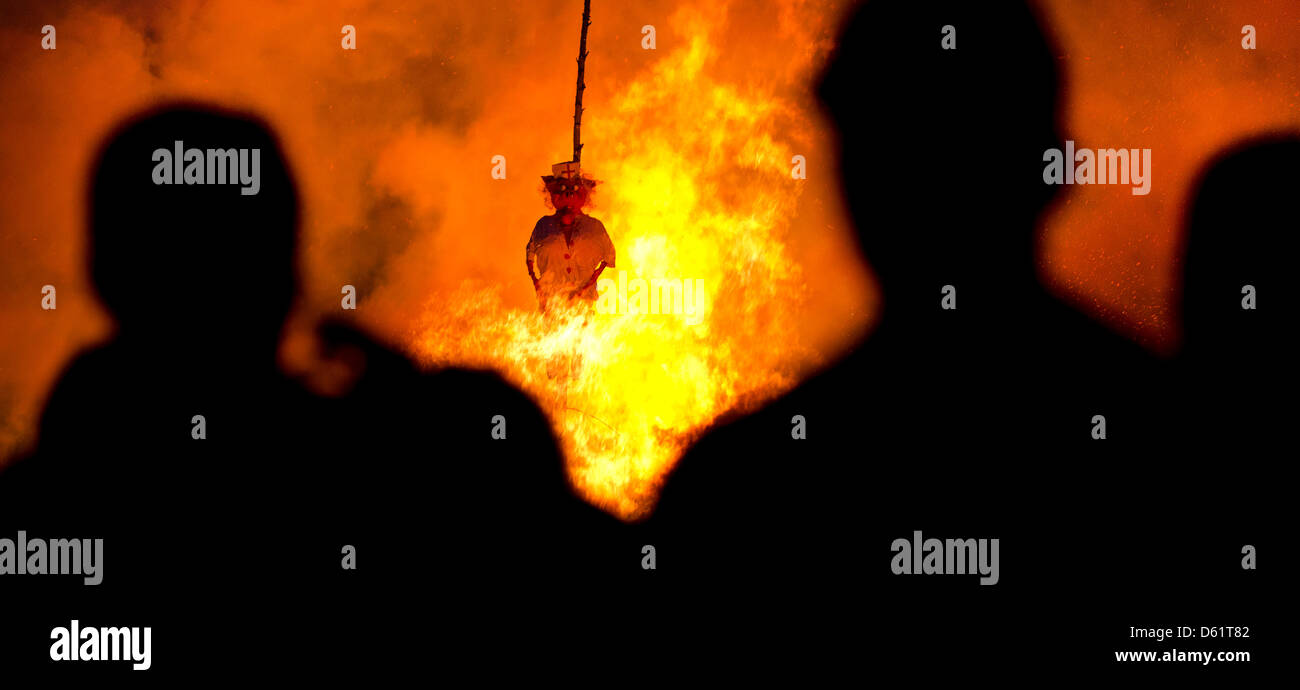 A symbolic witch is burnt in a bonfire during the Walpurgisnacht ...
