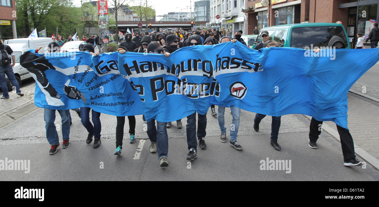 Autonomists hold a banner during a demonstration in Neumuenster ...