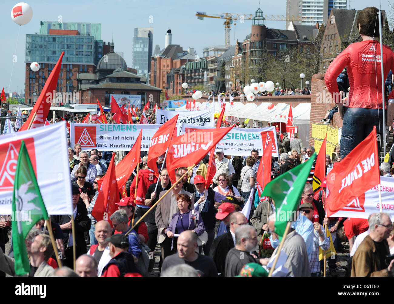 People take part in a demonstration of the German trade union ...