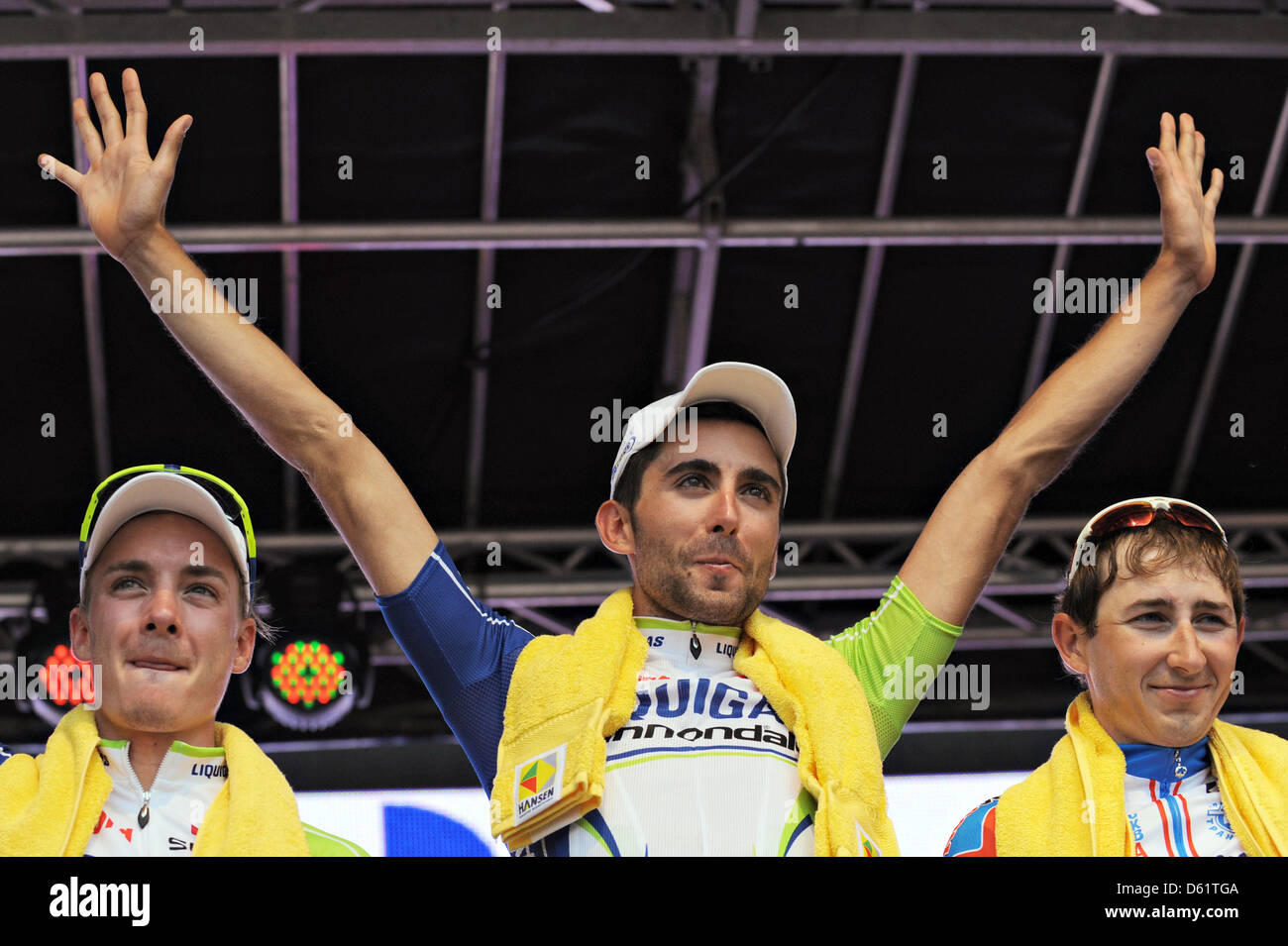 Italy's Moreno Moser (C) from team Liquigas-Cannondale celebrates first ...