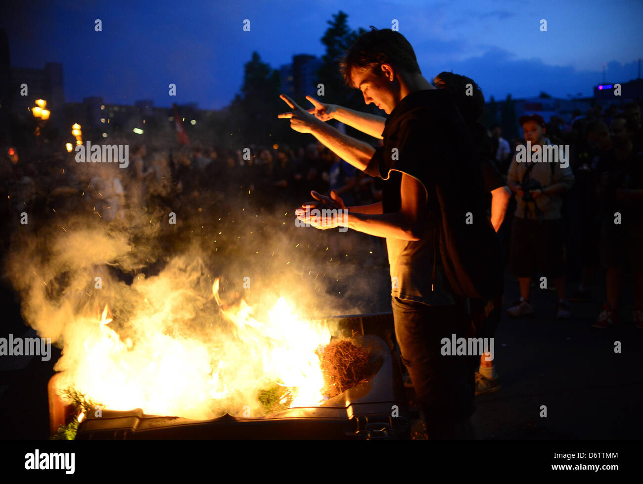 Protesters have lit garbage cans during a demonstration in Berlin ...