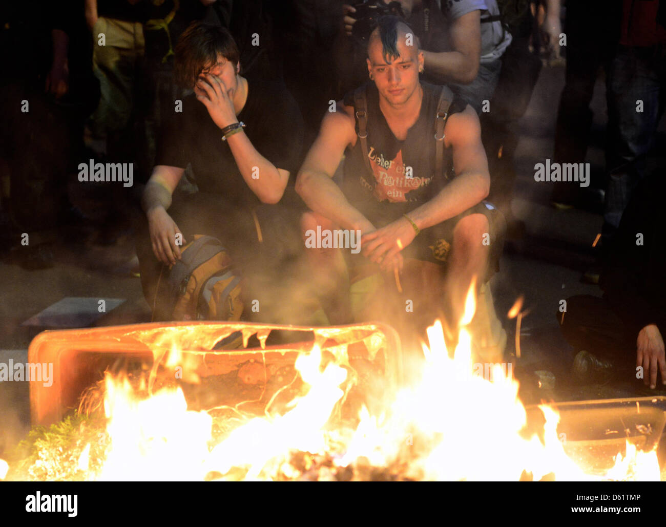 Protesters have lit garbage cans during a demonstration in Berlin ...