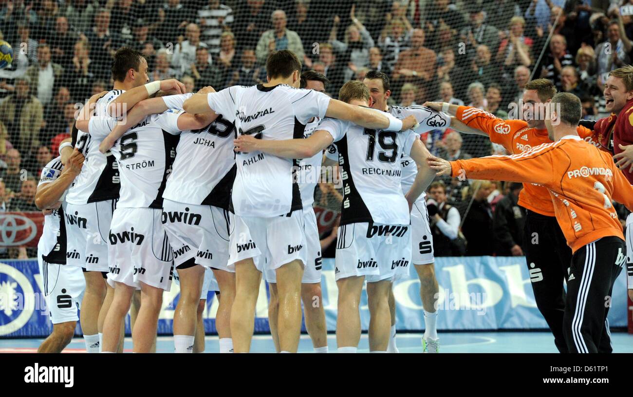 Kiel's players celebrate their victory after the handball Bundesliga ...