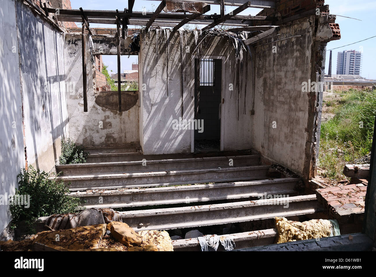 Garbage in the streets and homes destroyed due the financial crisis in ...