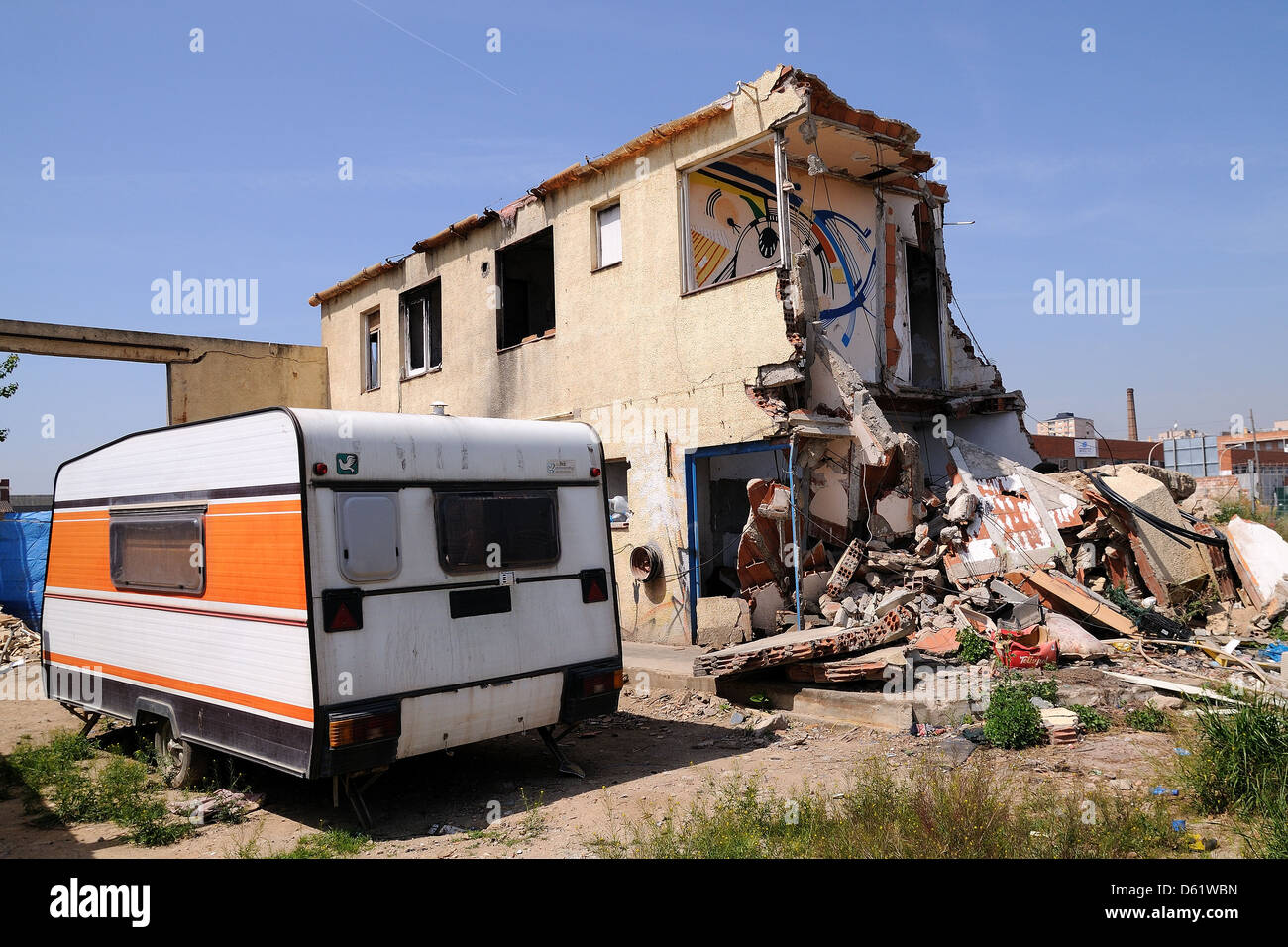 Garbage in the streets and homes destroyed due the financial crisis in ...