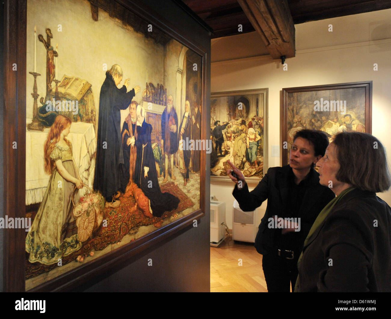 Visitors view the former reformation rooms at Wartburg Castle in ...