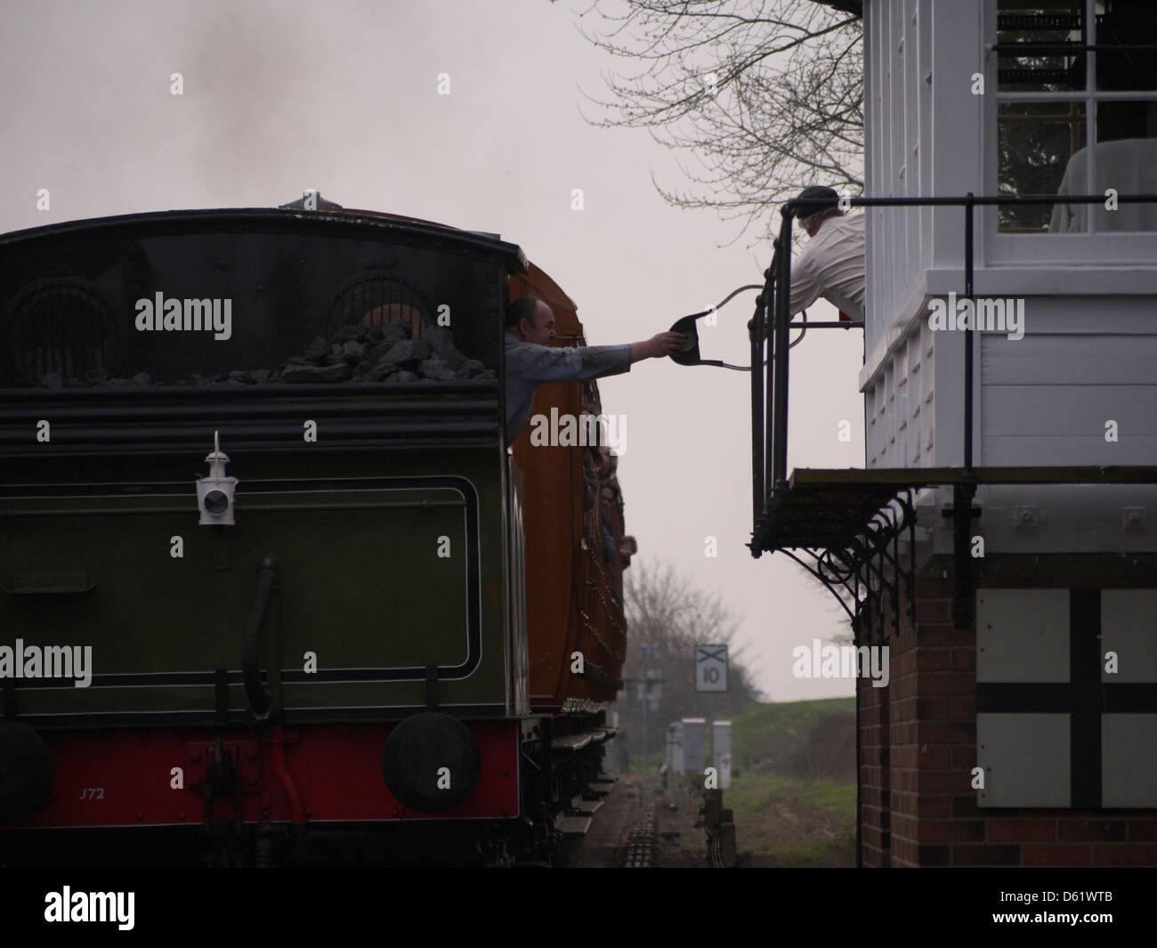 Collecting the right of way token from Sheringham signal box, North ...