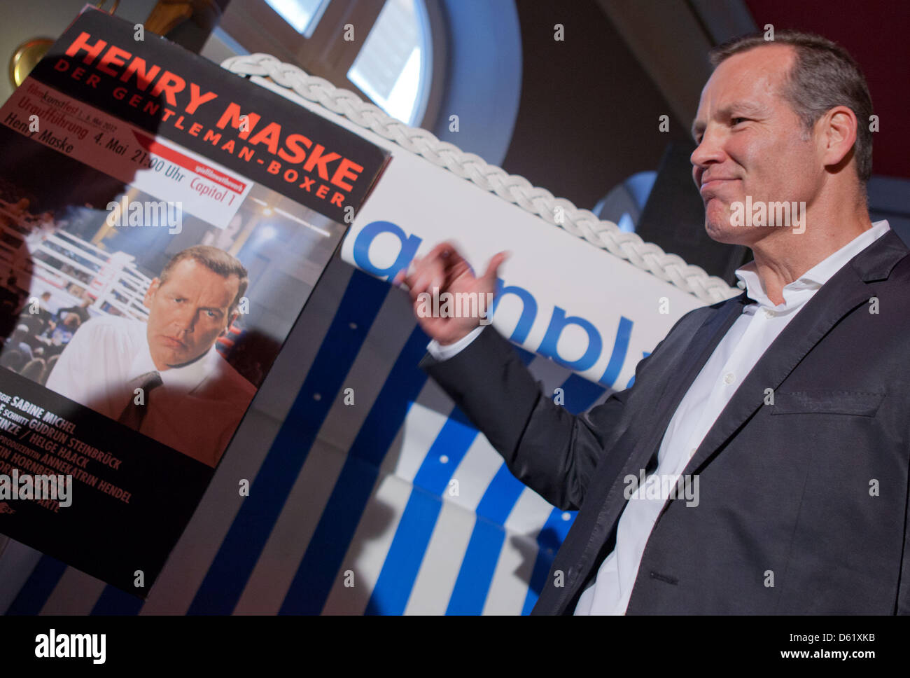 World Boxing Champion Henry Maske poses next to a poster of the ...