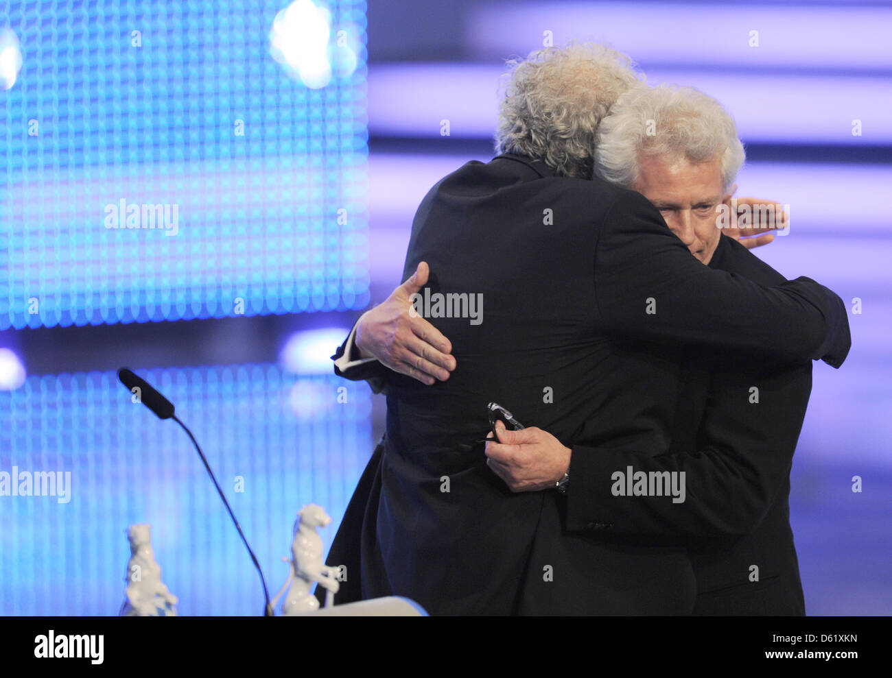 Actors Peter Udo Wachtveitl (L) and Miroslav Nemec hug each other at the Bavarian Televisioni ...