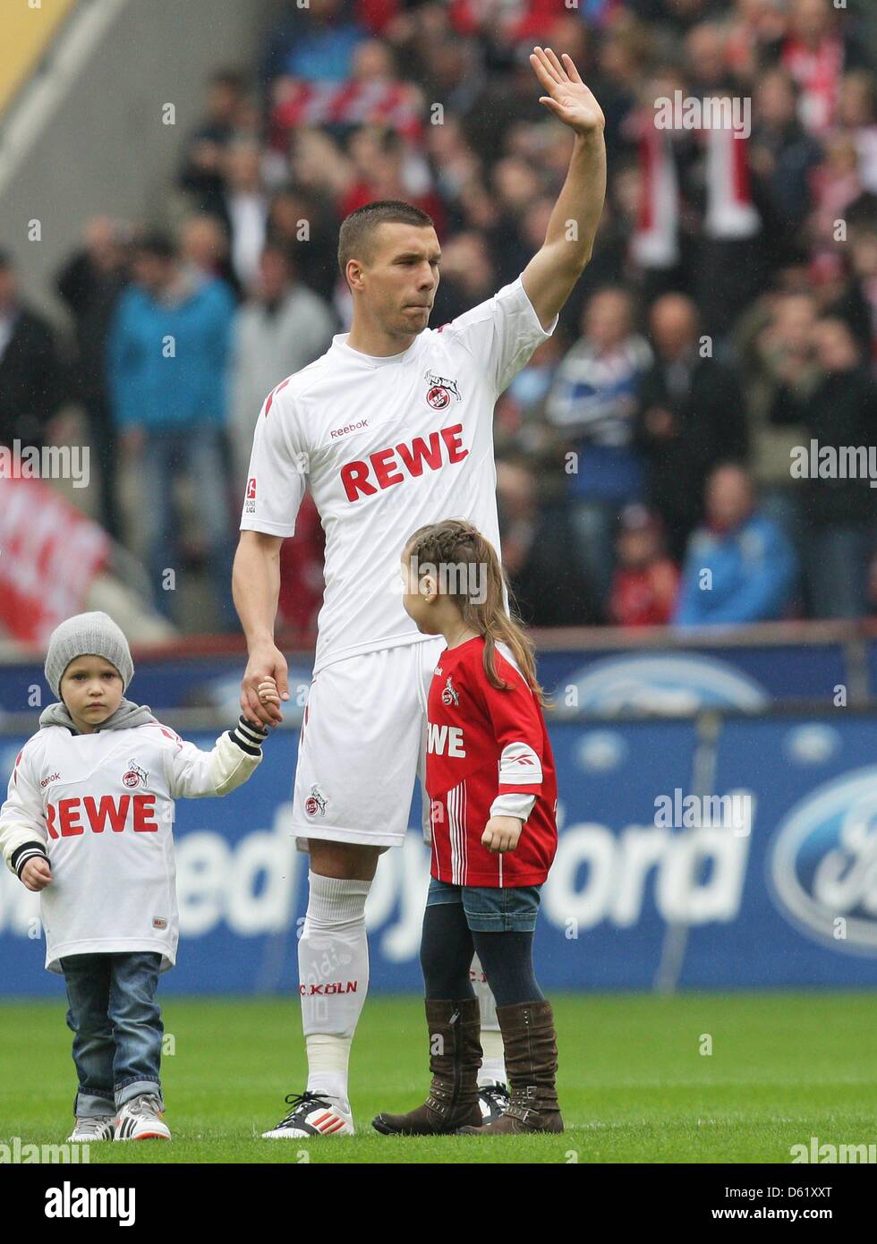 Cologne's Lukas Podolski poses with his children during his farewell ...