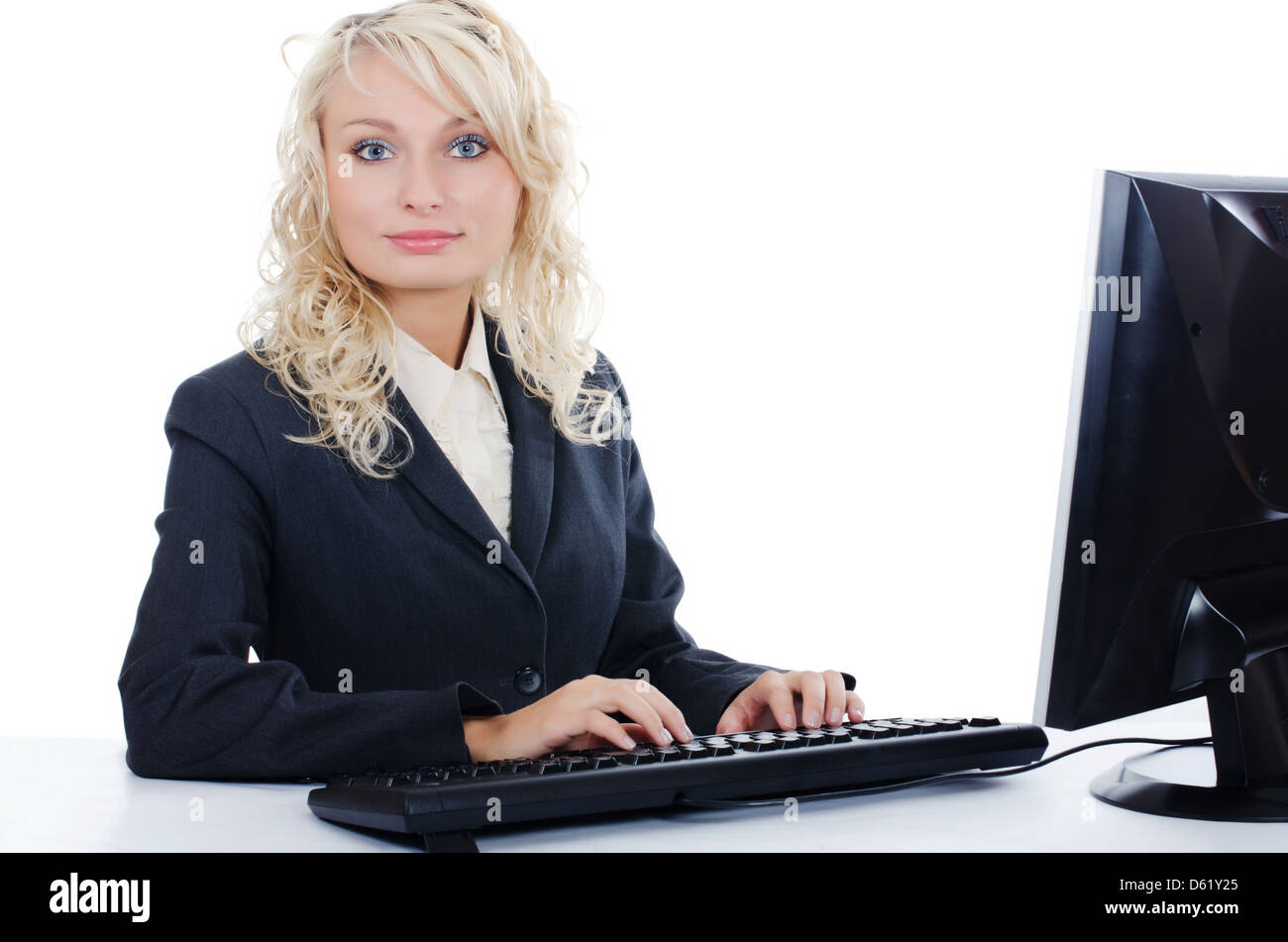 The young girl behind the computer Stock Photo - Alamy