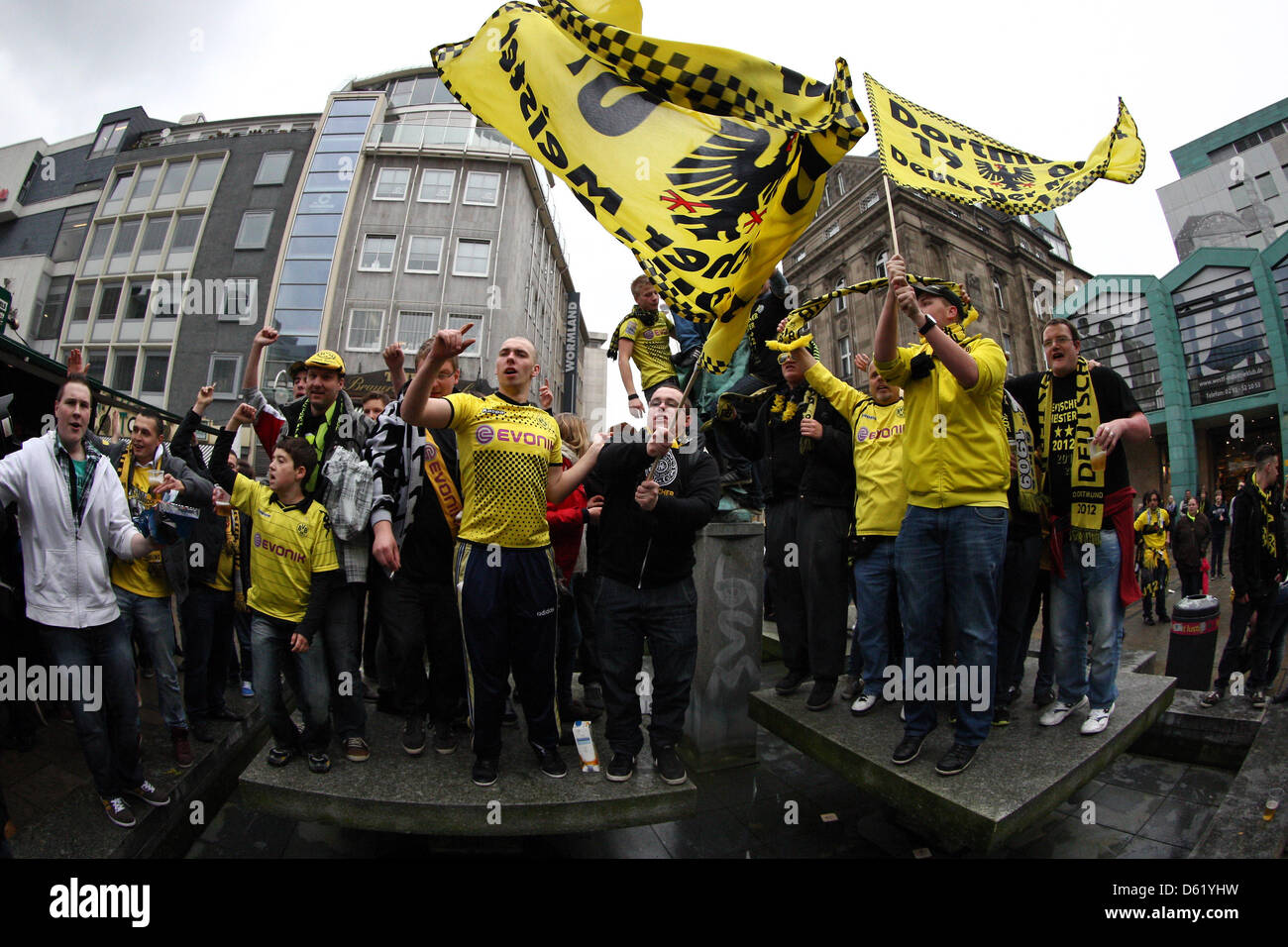 Fans of Bundesliga soccer club Borussia Dortmund celebrate their teams ...