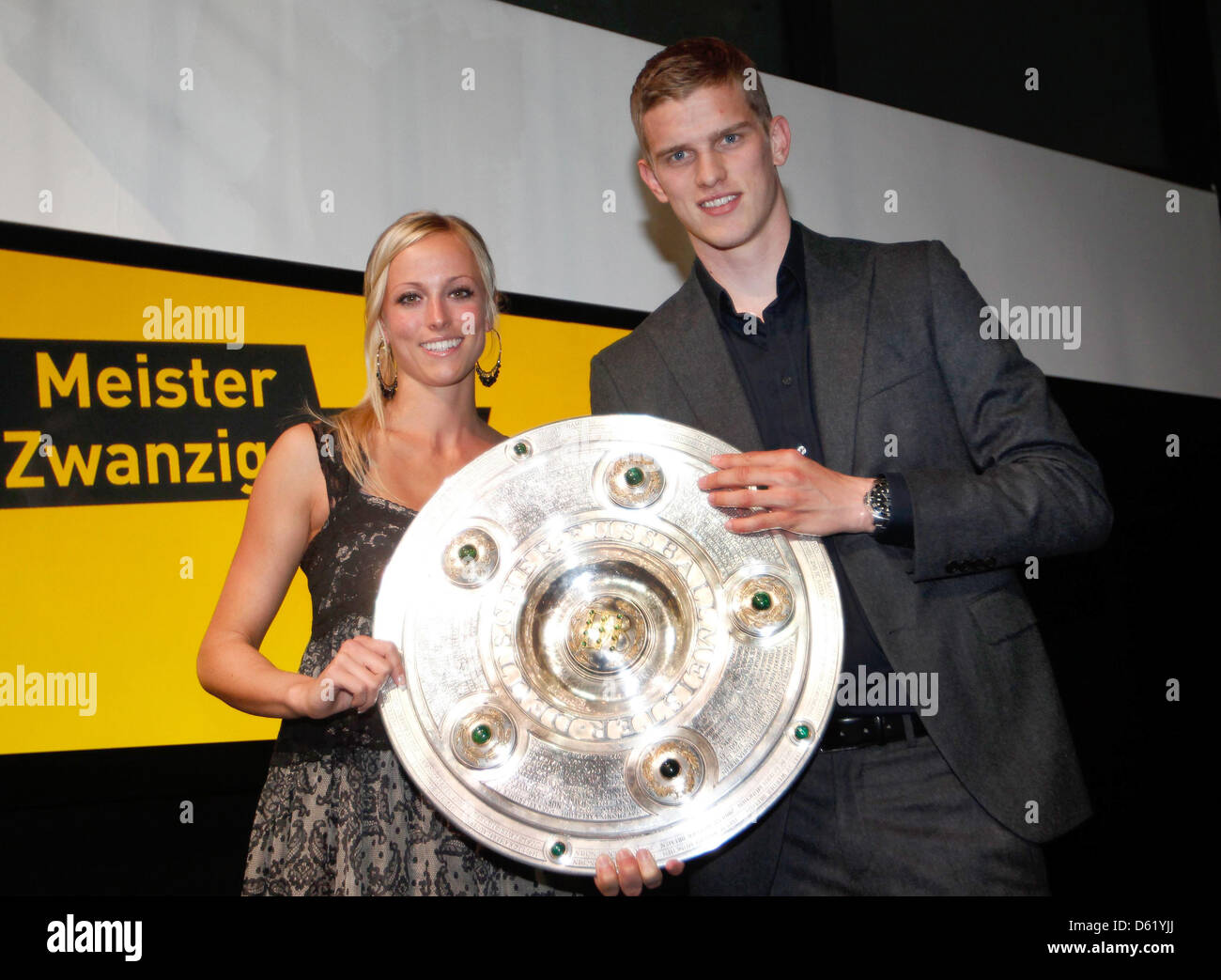 Borussia Dortmund's Sven Bender and his girlfriend Simone pose with the ...
