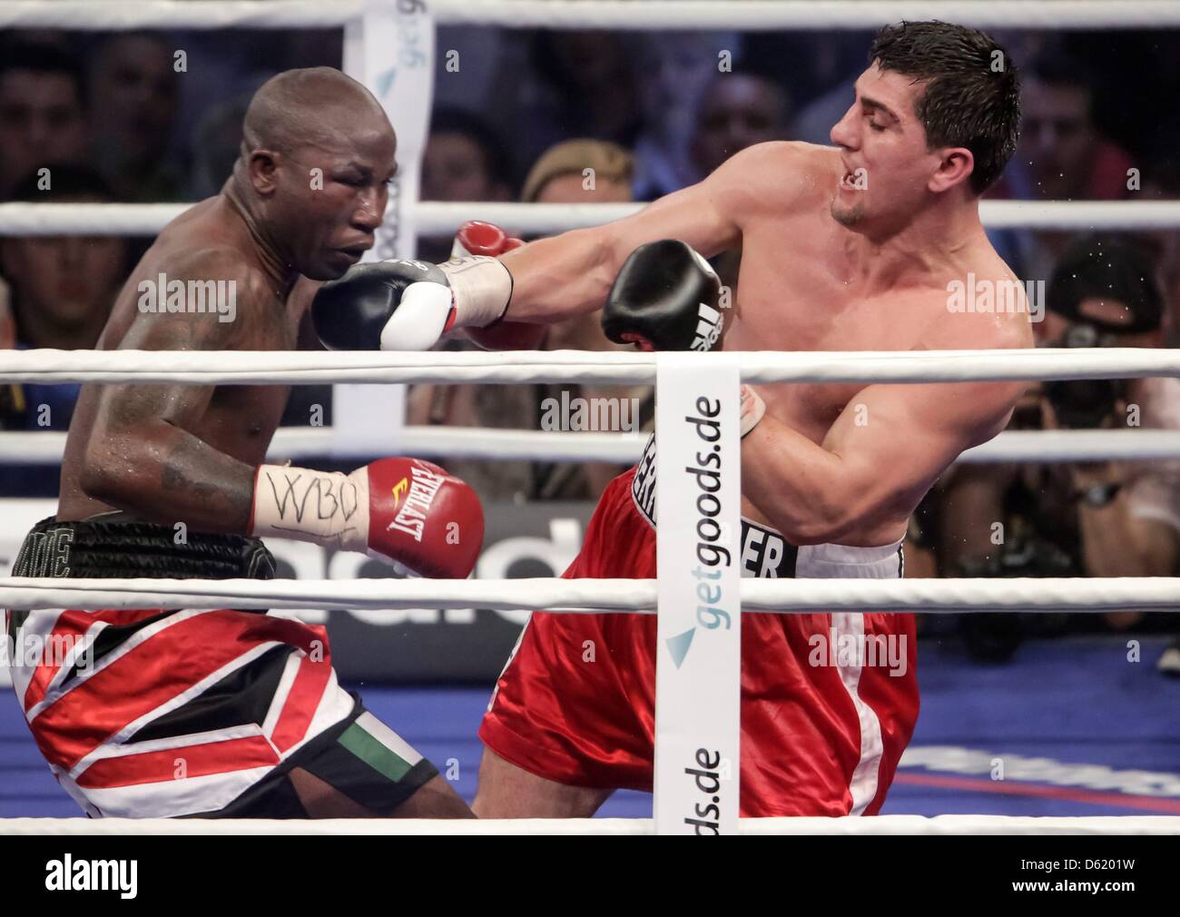 German professional boxer Marco Huck (R) and Ola Afolabi from Great ...