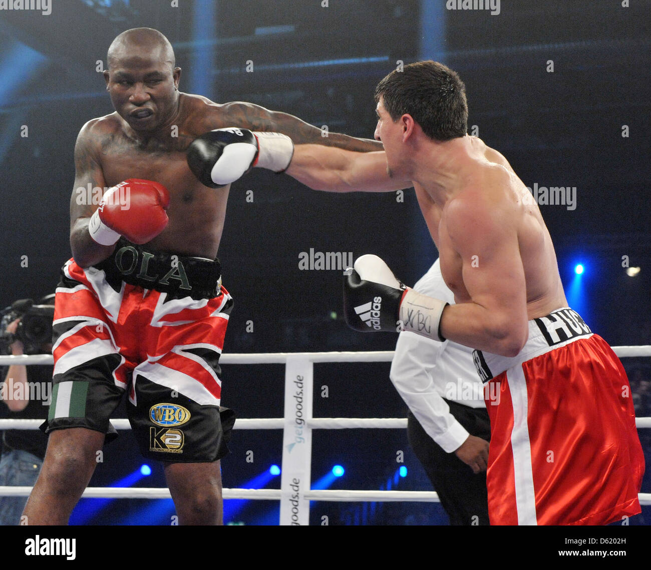 German professional boxer Marco Huck (R) and Ola Afolabi from Great ...