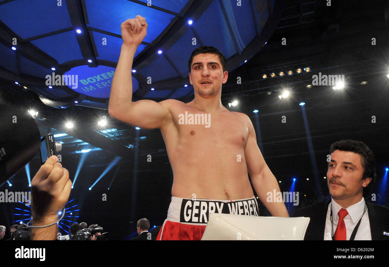German professional boxer Marco Huck celebrates after the fight for the ...