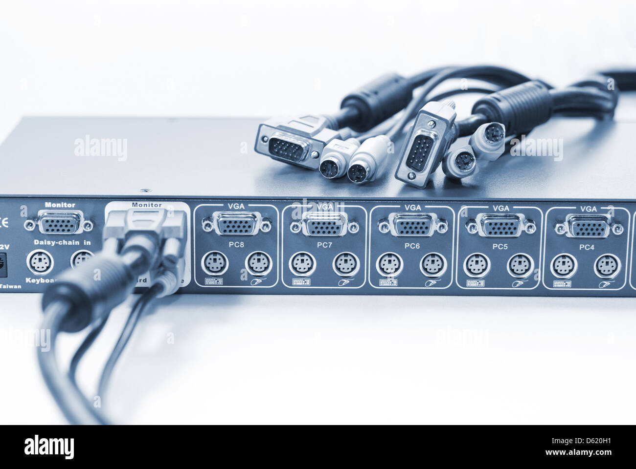 KVM (keyboard, video and mouse) switch and network cables, blue ...
