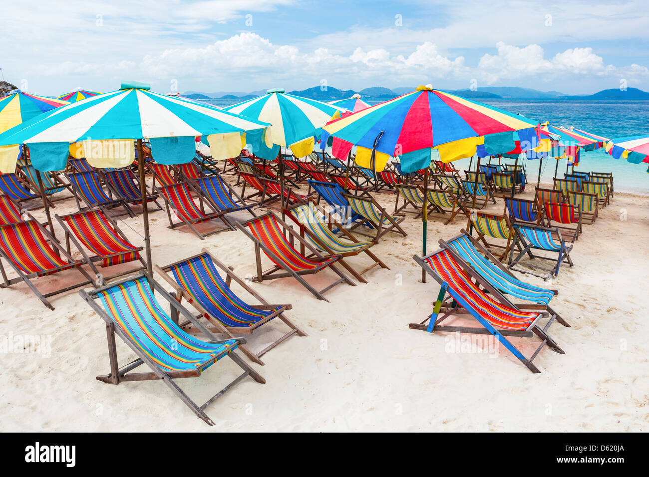 Beach chair and umbrellas on the beach - Kay Island, Thailand Stock ...