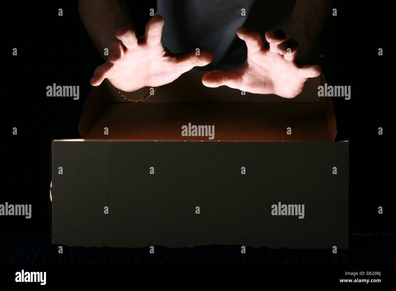 hands fihd light magic treasure Stock Photo - Alamy