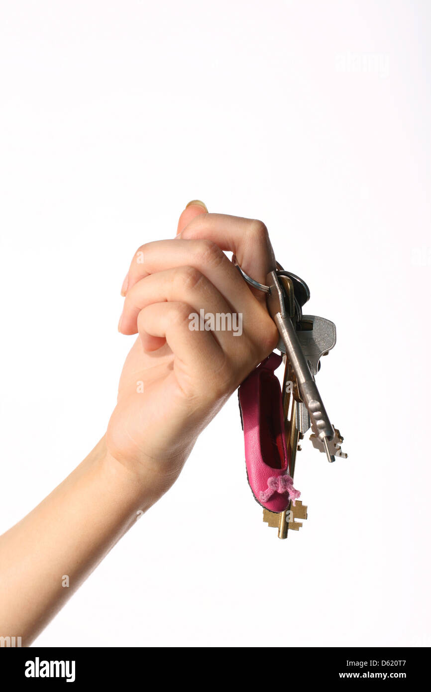 Girl holding key door hi-res stock photography and images - Alamy