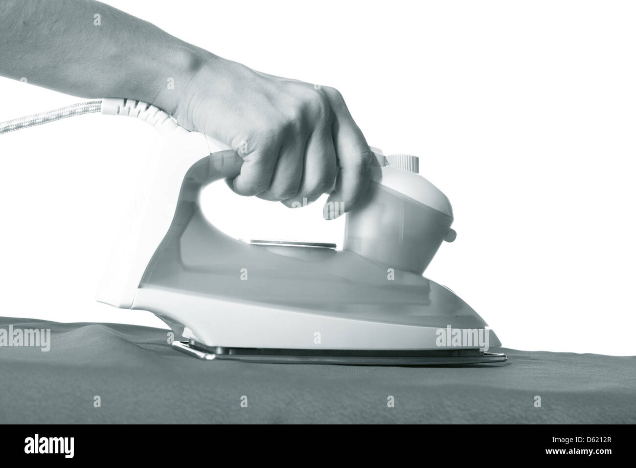 girl hand have to iron red material Stock Photo - Alamy