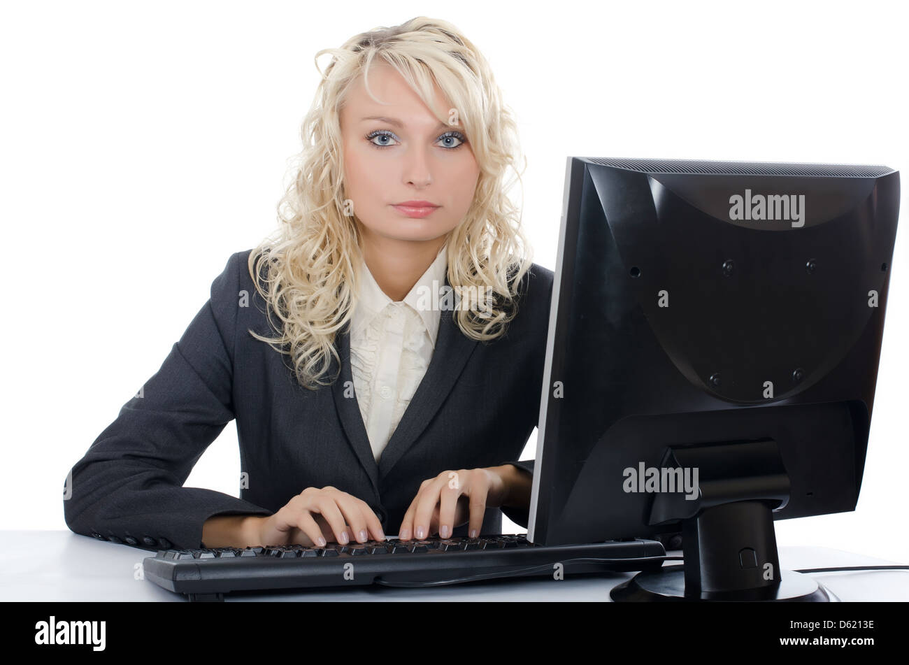The young girl behind the computer Stock Photo - Alamy