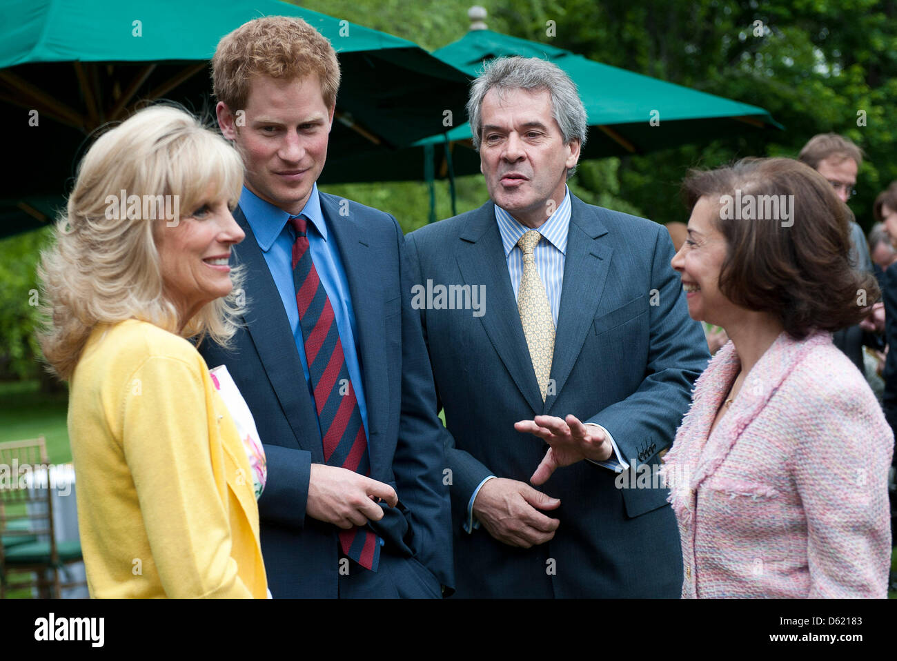 Britain's Prince Harry (2nd L) and Sir Peter Westmacott (2nd R), the ...