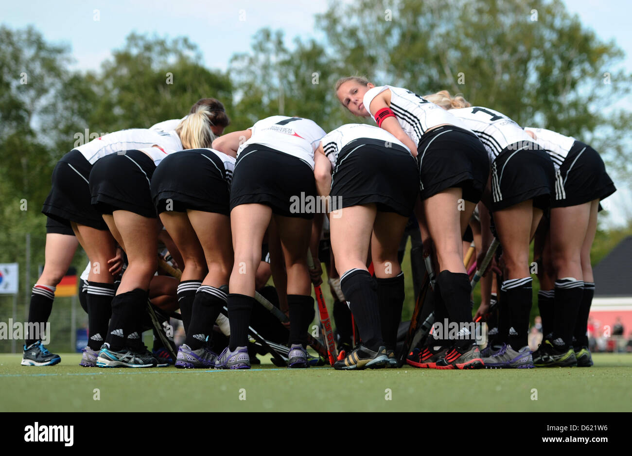Germany's team captain Fanny Rinne (3-R) looks around during a huddle ...