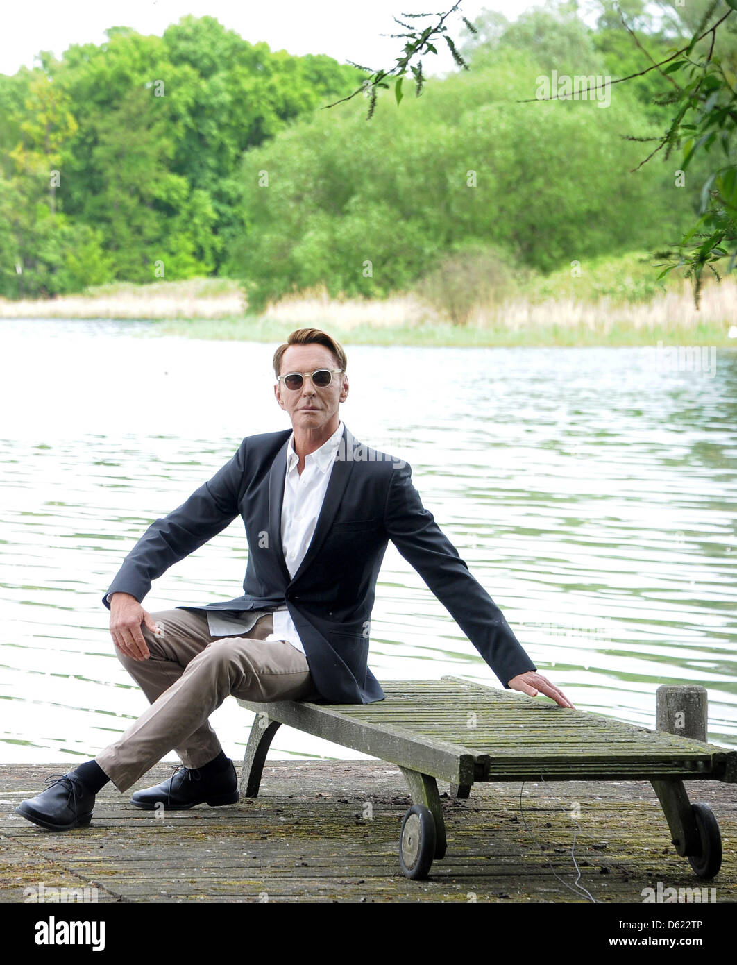 German fashion designer Wolfgang Joop poses on a jetty at Heiligen See ...