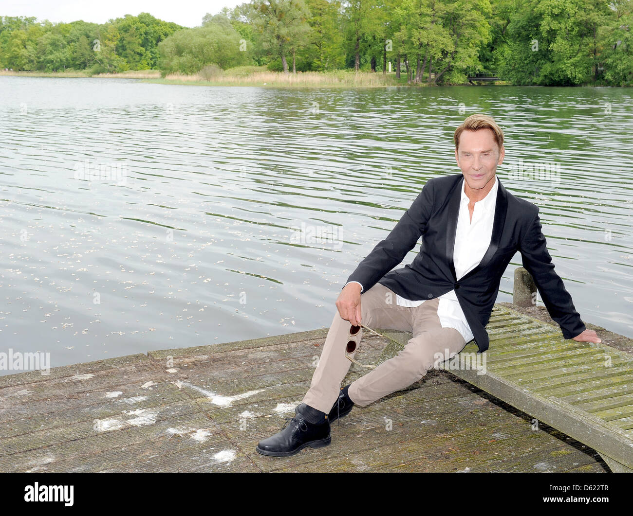 German fashion designer Wolfgang Joop poses on a jetty at Heiligen See ...