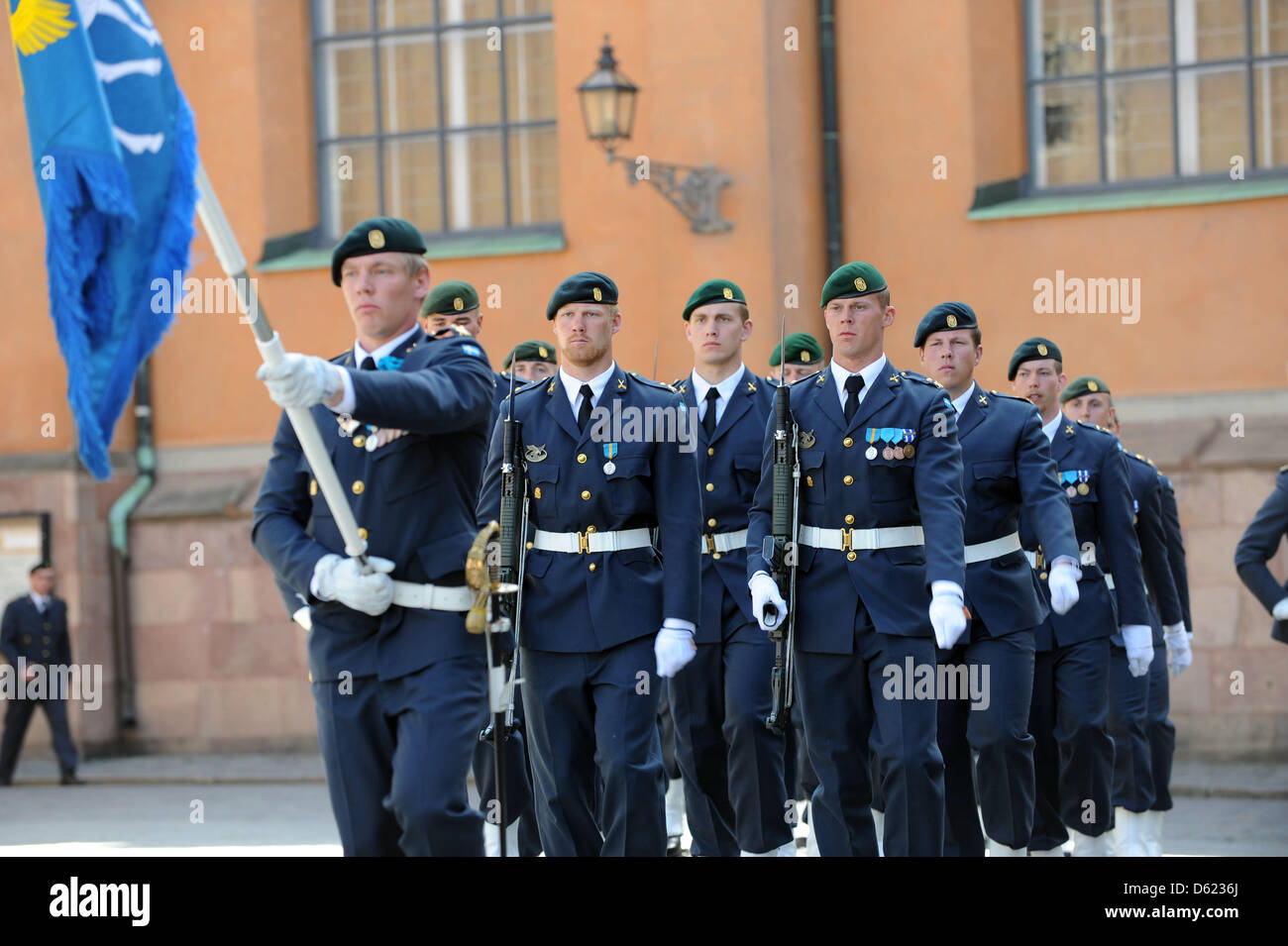 Guard soldiers march in front of the Royal Palace in Stockholm, Sweden ...