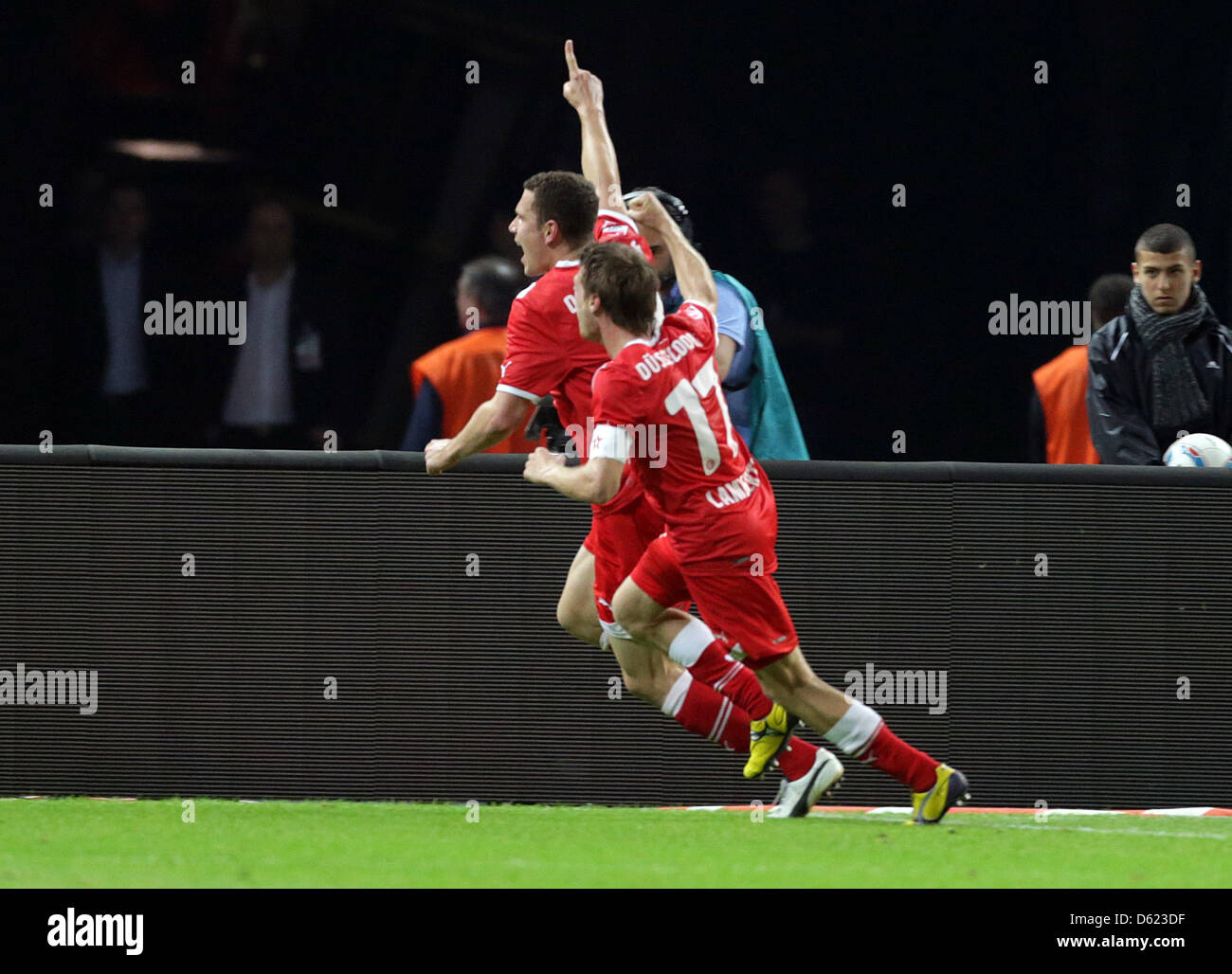 Duesseldorf's Thomas Broeker celebrates his 1-1 goal with team-mate ...