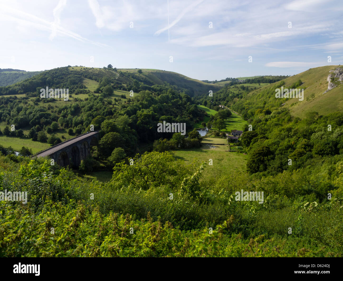 Monsal Dale valley and viaduct with surrounding green hills in the ...