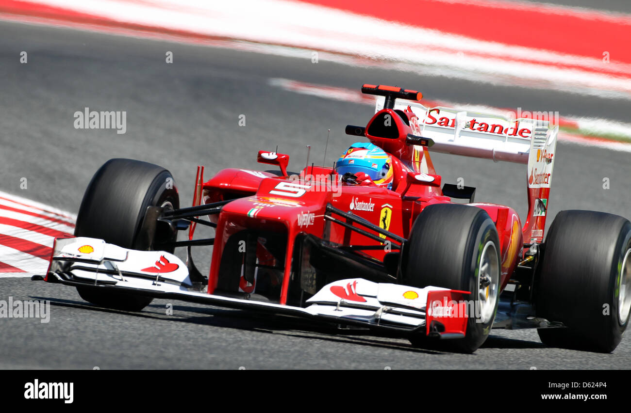 Spanish Formula One driver Fernando Alonso of Ferrari steers his car ...