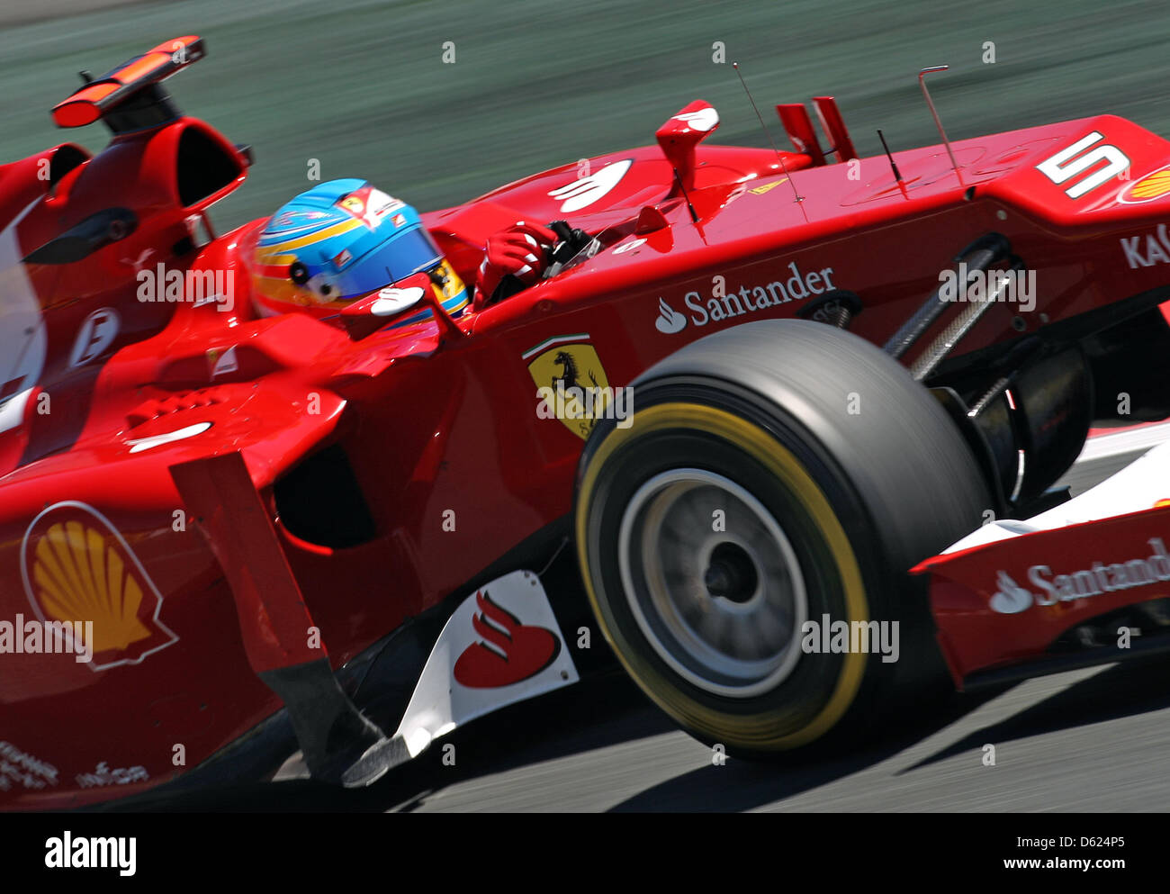 Spanish Formula One driver Fernando Alonso of Ferrari steers his car ...