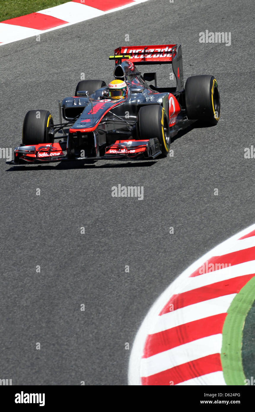 British Formula One driver Lewis Hamilton of McLaren Mercedes steers ...