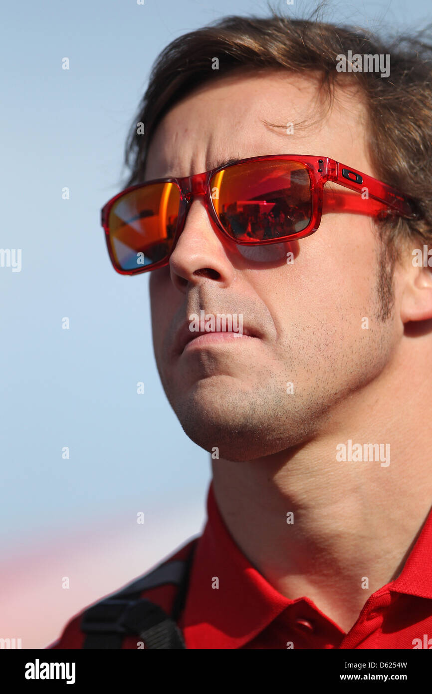 Spanish Formula One driver Fernando Alonso of Ferrari arrives at the ...