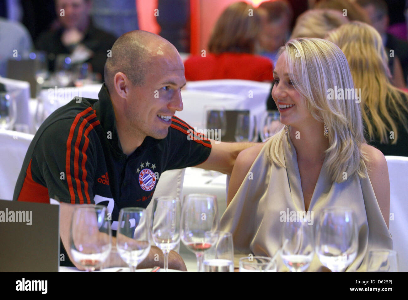 BERLIN, GERMANY - MAY 13: Arjen Robben of Muenchen talks to his wife ...