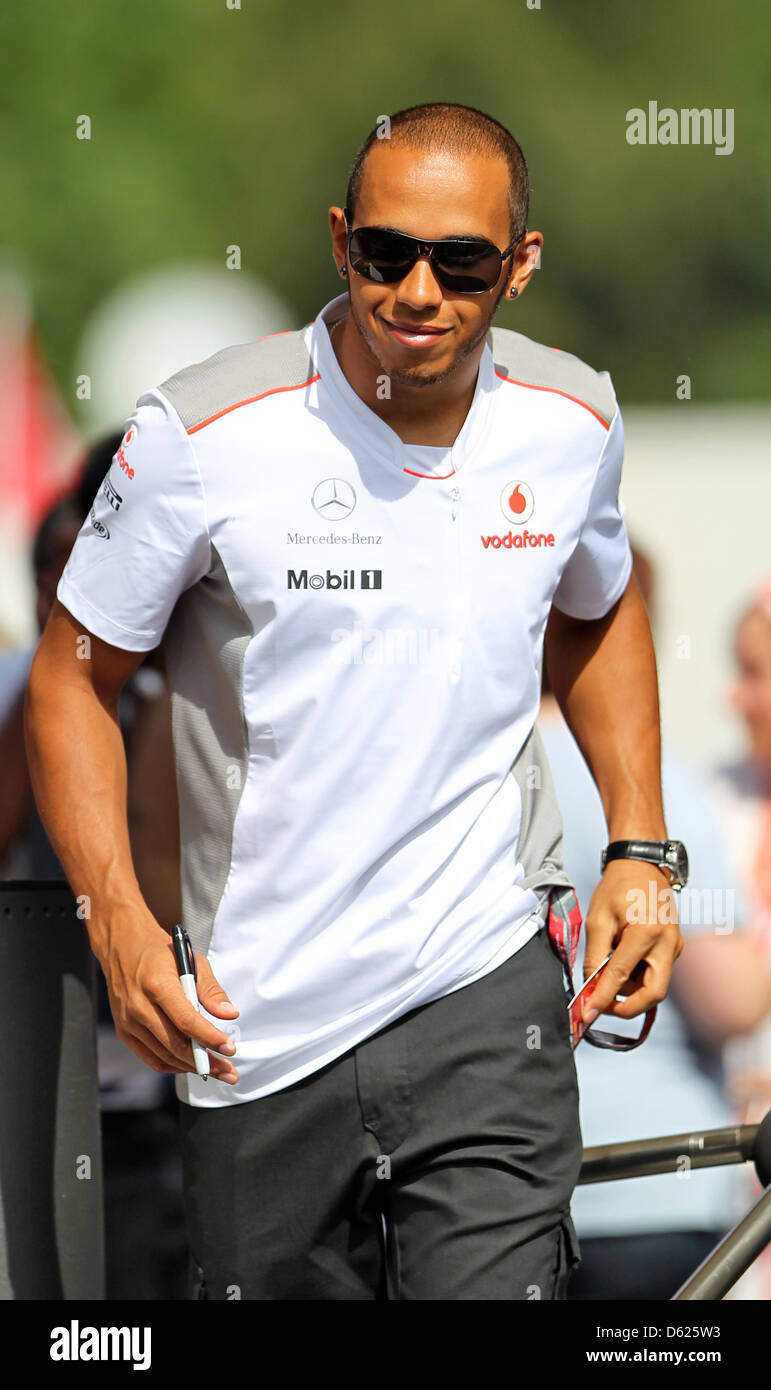 British Formula One driver Lewis Hamilton of McLaren Mercedes arrives ...