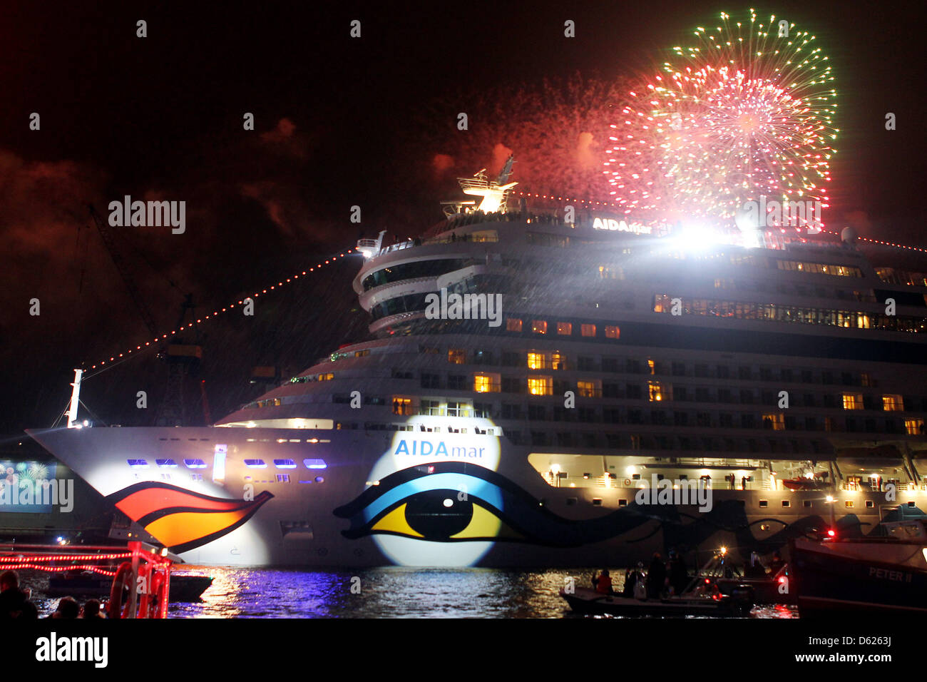 Fireworks explode above the newly named cruise ship 'AIDA mar' during ...