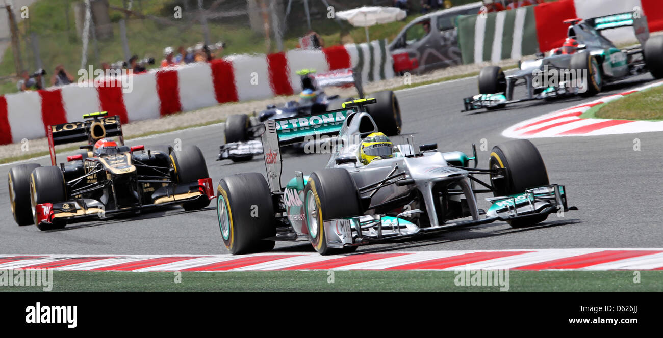 German Formula One driver Nico Rosberg of Mercedes AMG (front), French ...