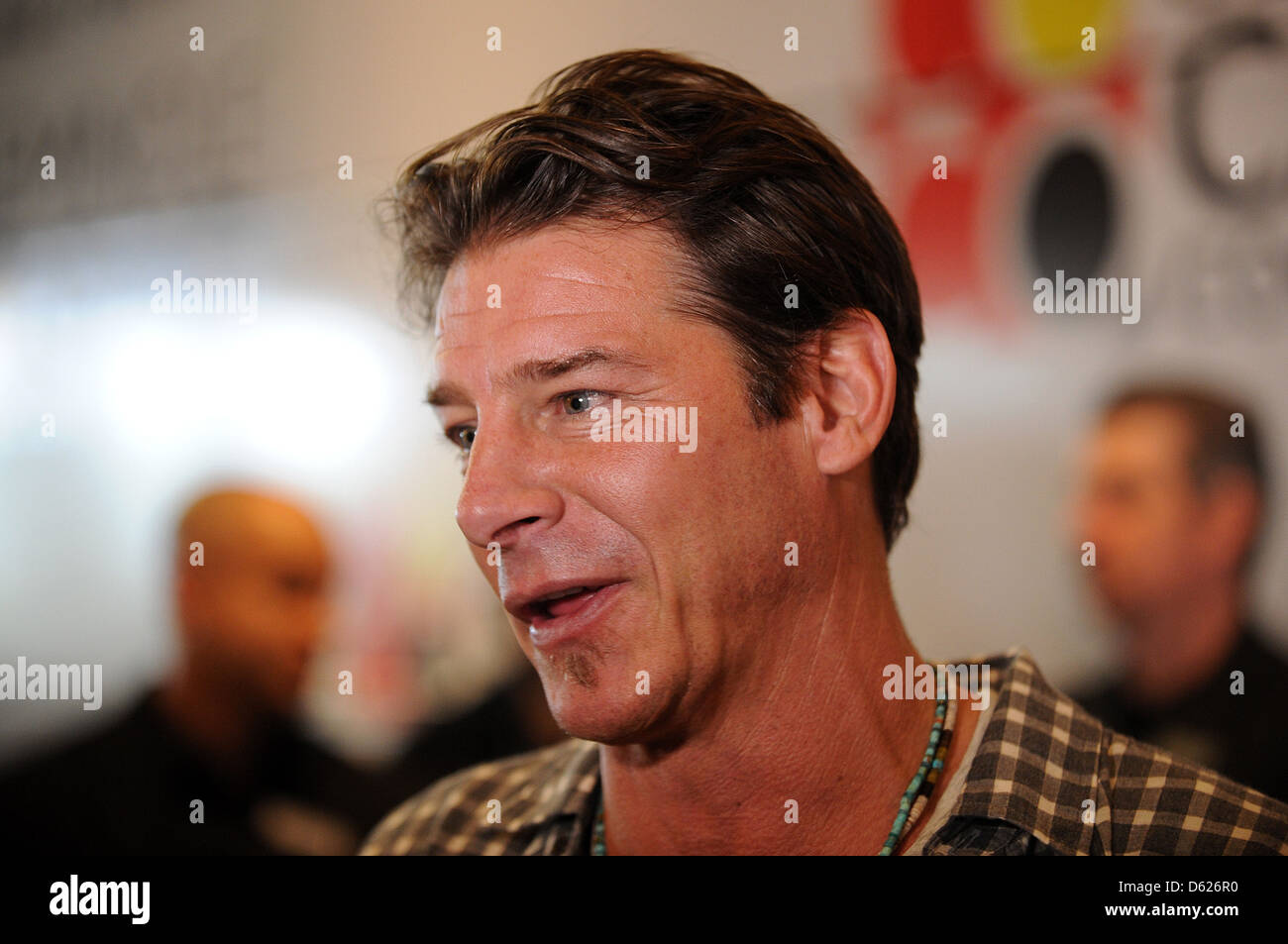 Ty Pennington 'Moves That Bus' to celebrate the grand opening of the ...