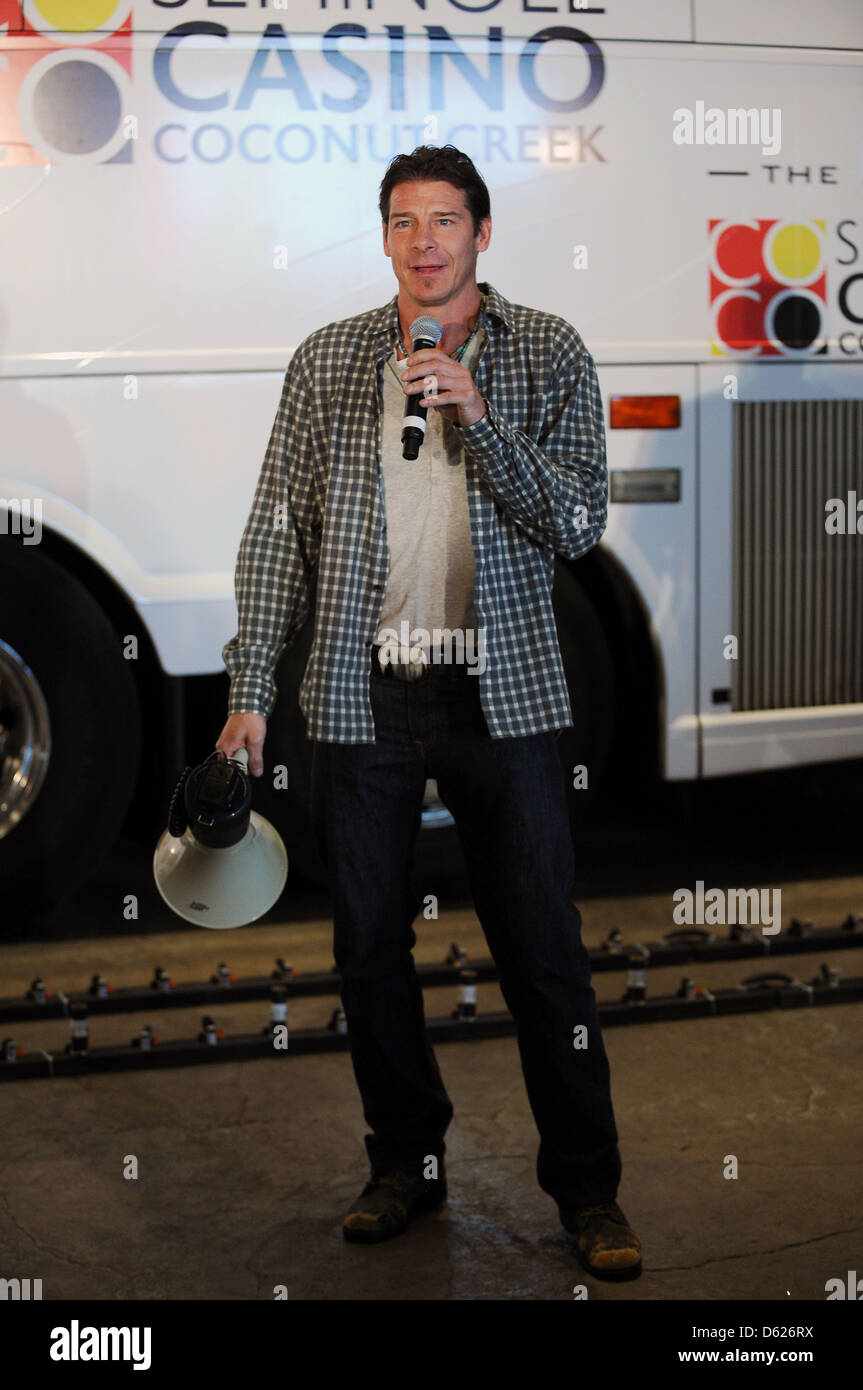 Ty Pennington 'Moves That Bus' to celebrate the grand opening of the ...